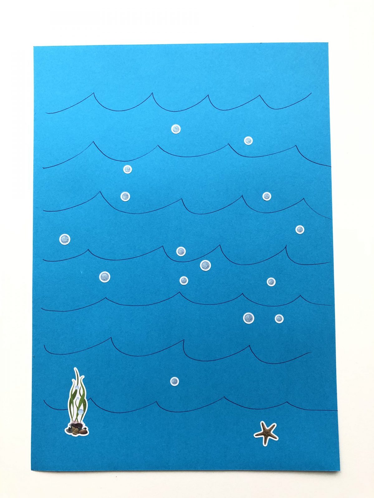 “Save the fishies” sticker activity – Happy Mommy Pose