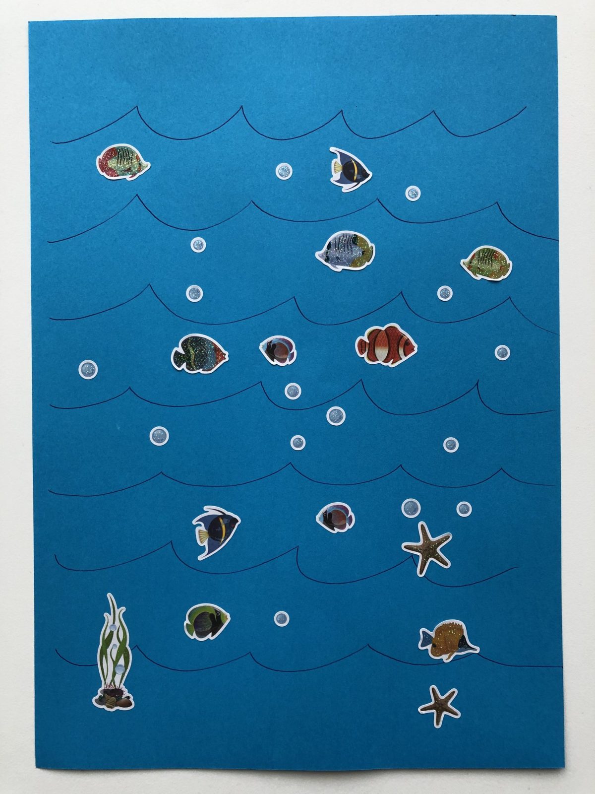 “Save the fishies” sticker activity – Happy Mommy Pose