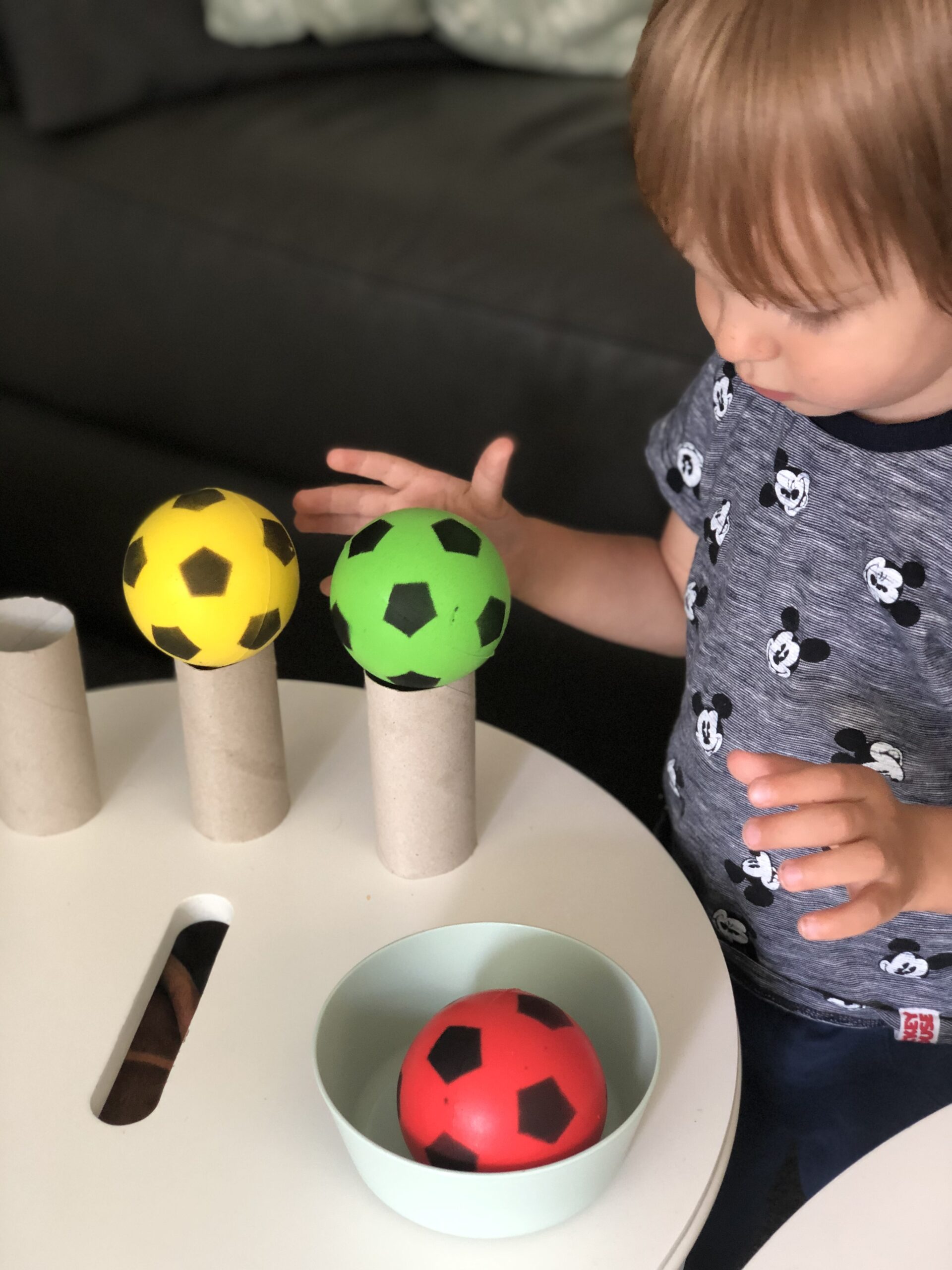 Balancing balls activity – Happy Mommy Pose
