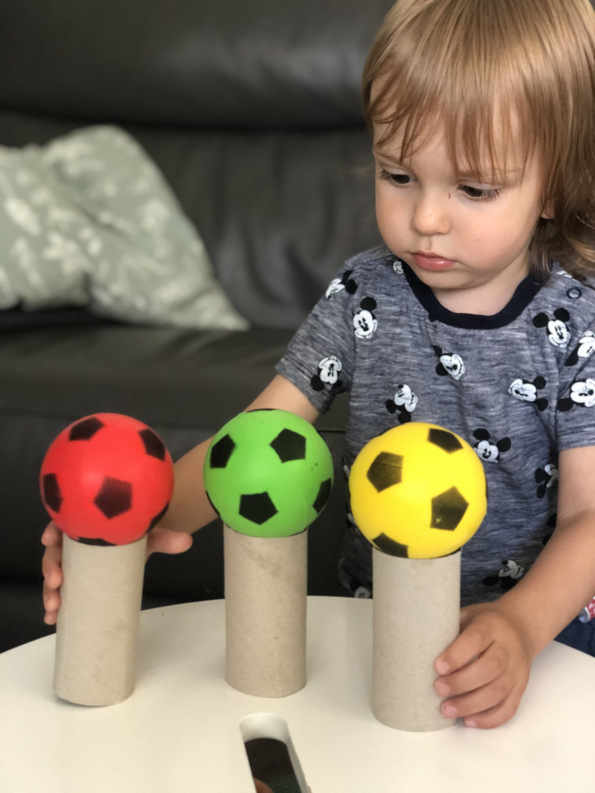 Balancing balls activity – Happy Mommy Pose